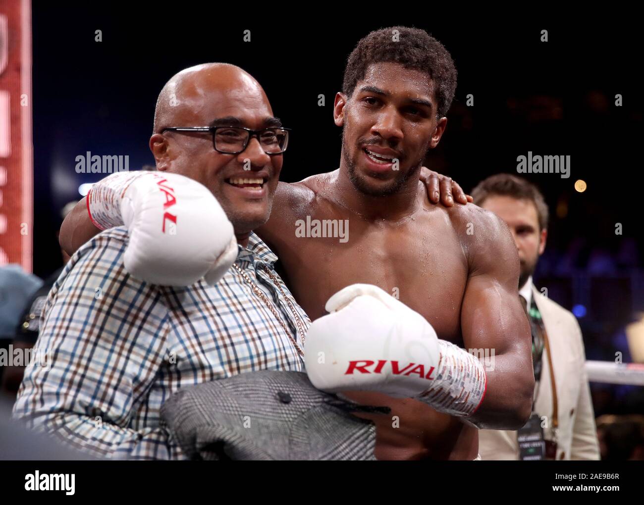 Anthony Joshua with his father Robert Joshua after reclaiming the IBF ...