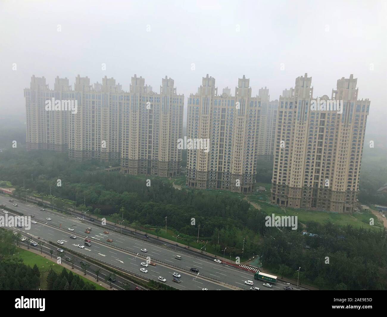 Top view highway with severe air pollution, fog and haze in Beijing ...
