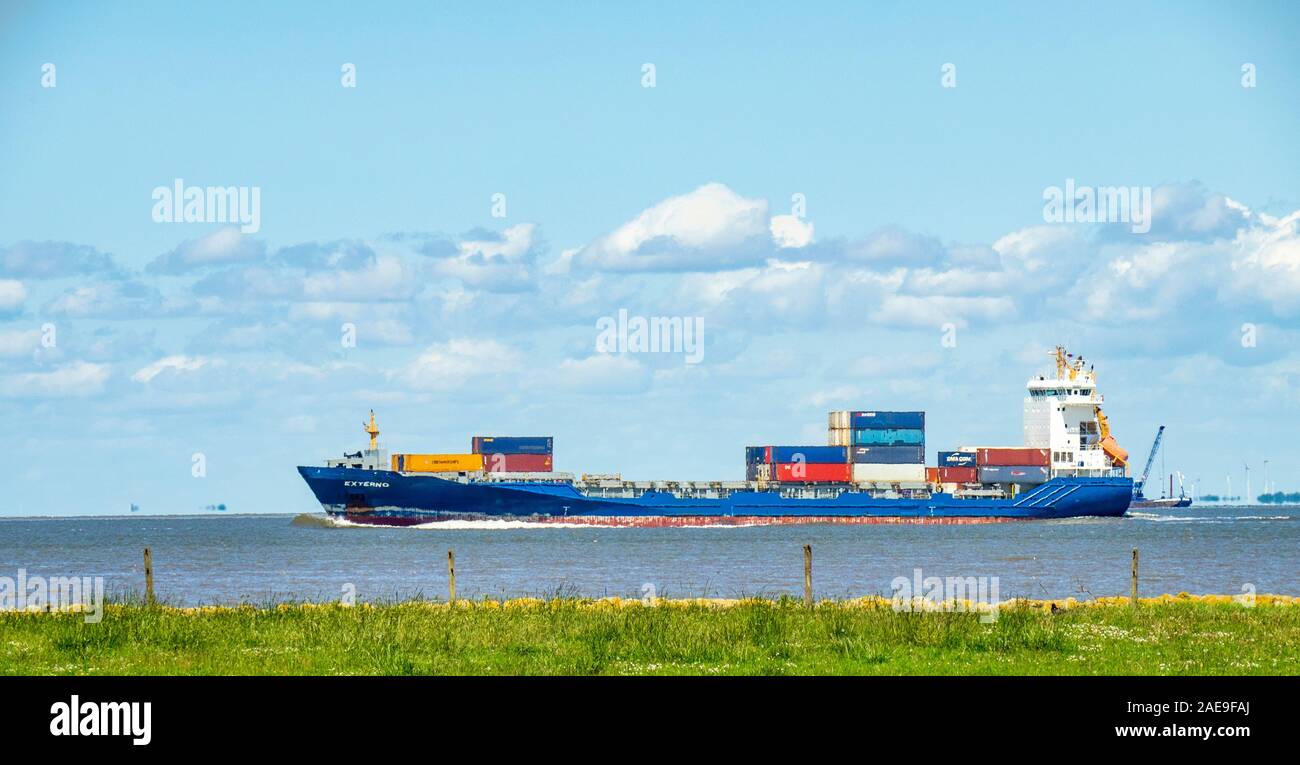 Container ship EXTERNO sailing along the Elbe River Cuxhaven lower ...