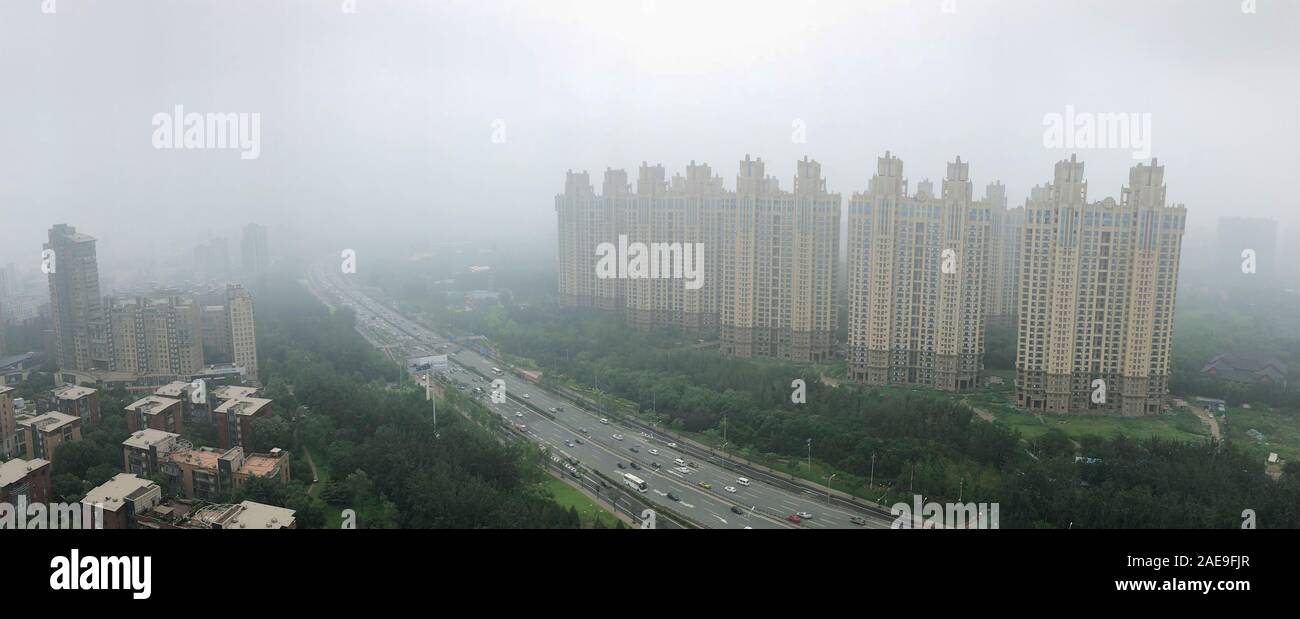 Top view highway with severe air pollution, fog and haze in Beijing ...