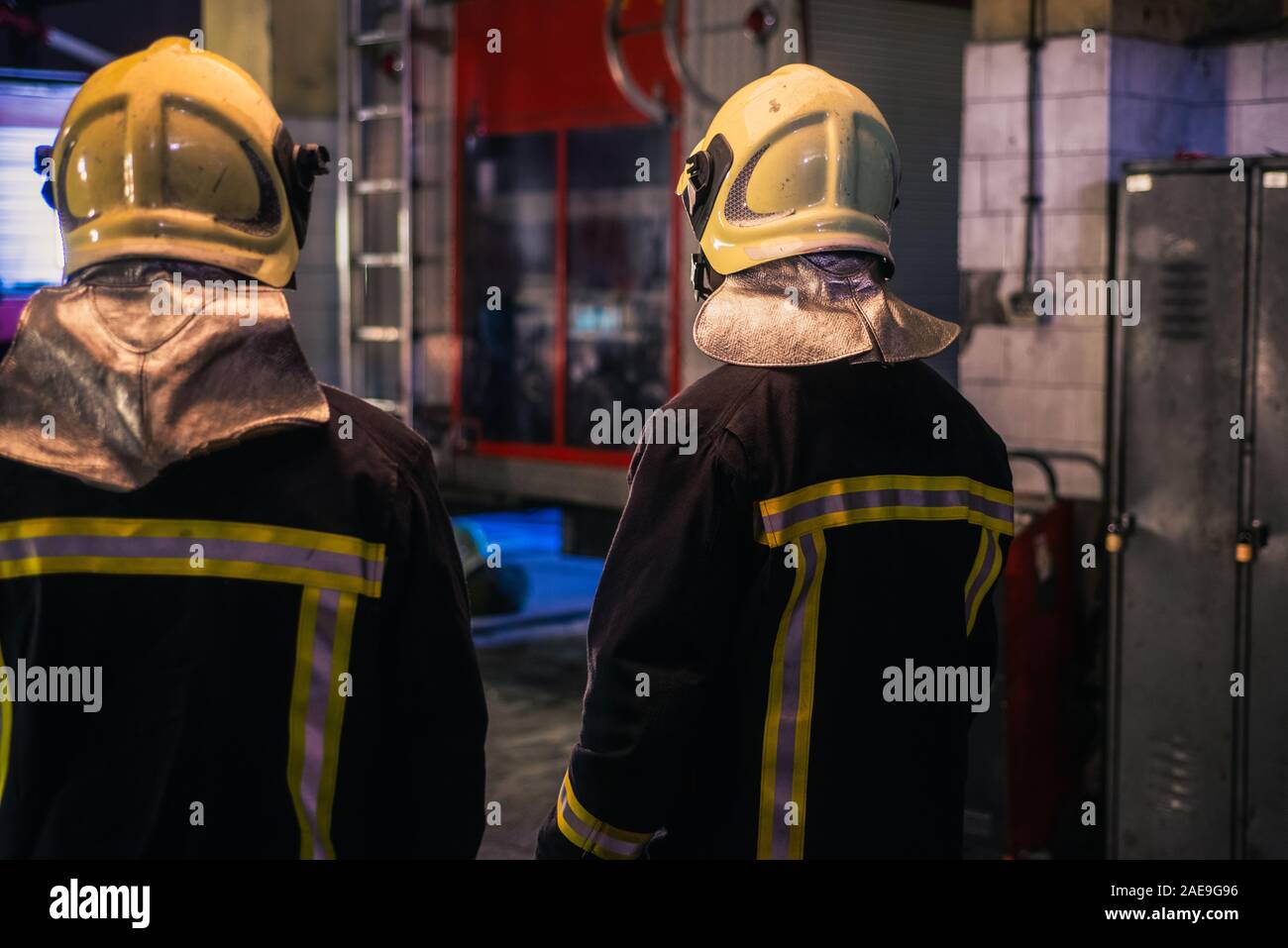 Young fire fighter wearing helmet hi-res stock photography and images ...