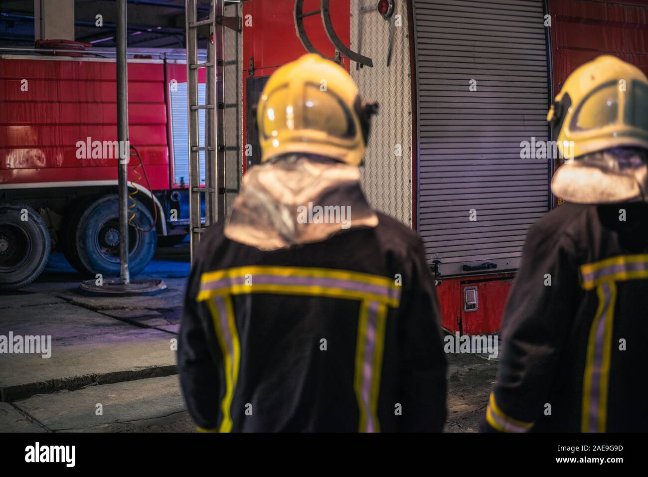 Young fire fighter wearing helmet hi-res stock photography and images ...