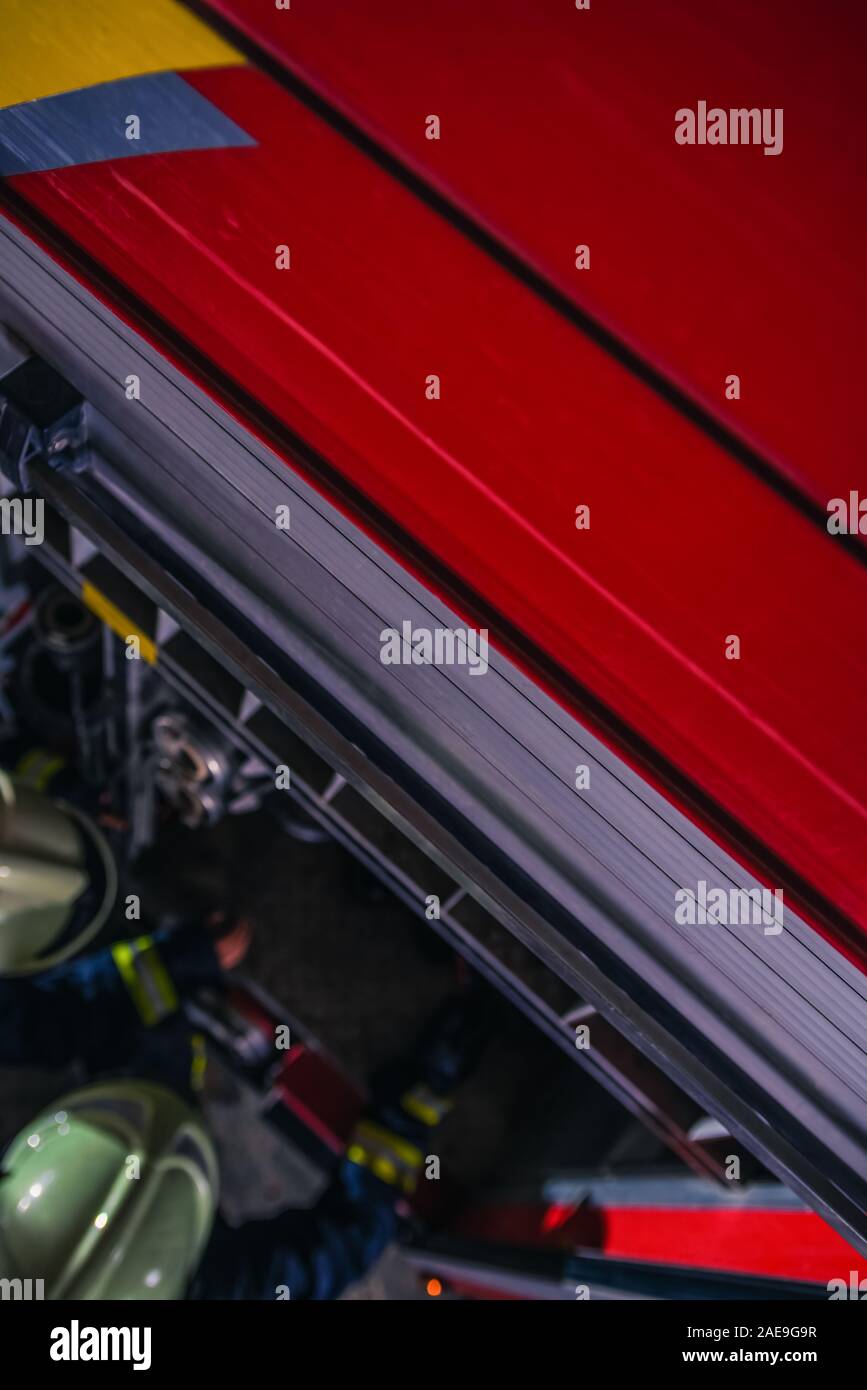 Firemen checking the fire engine inside the fire department from a bird ...