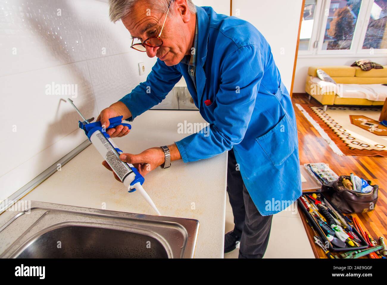 Man caulking gun on hi-res stock photography and images - Alamy