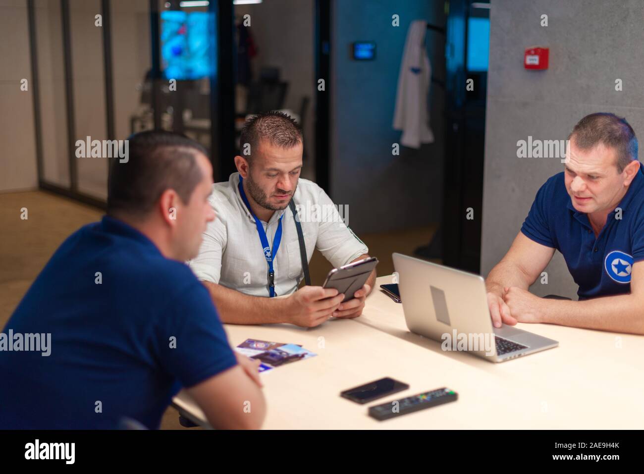 Security guards meeting in the main control data center Stock Photo - Alamy