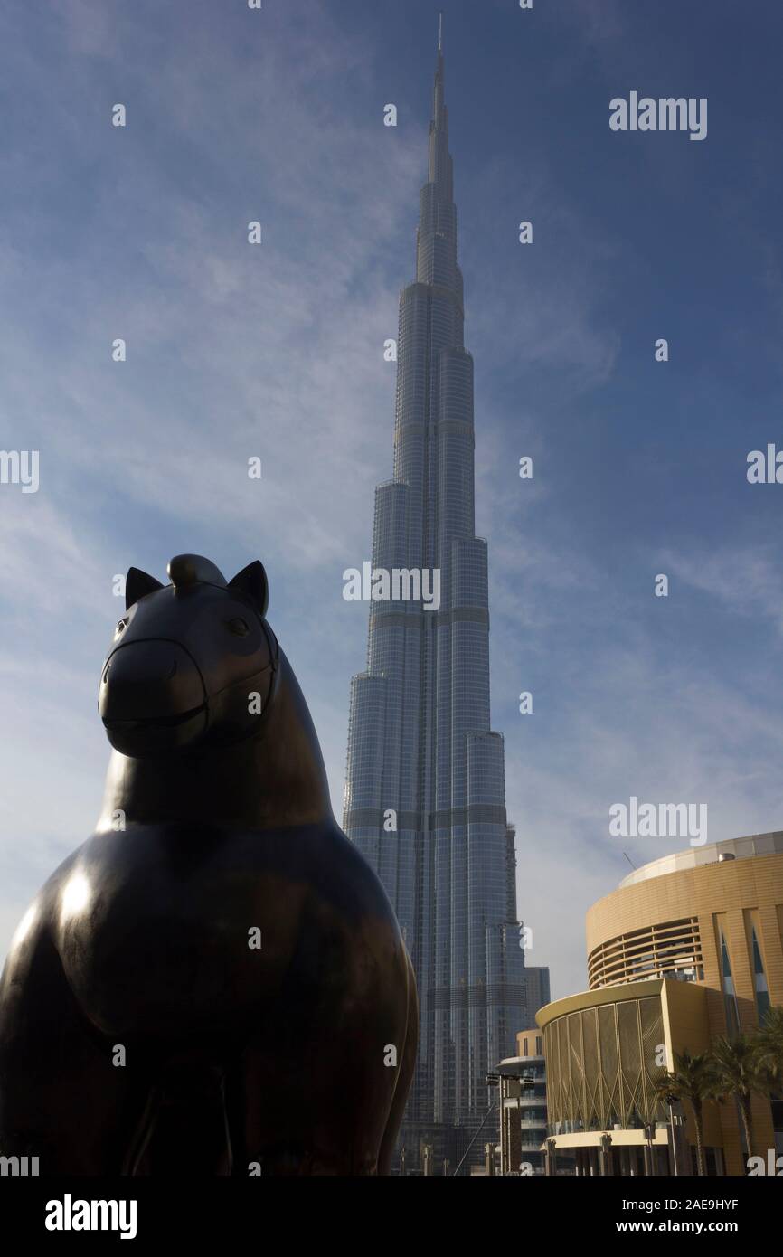 DUBAI, UAE - DECEMBER 26 2017: Horse of Botero in front of Burj Khalifa ...