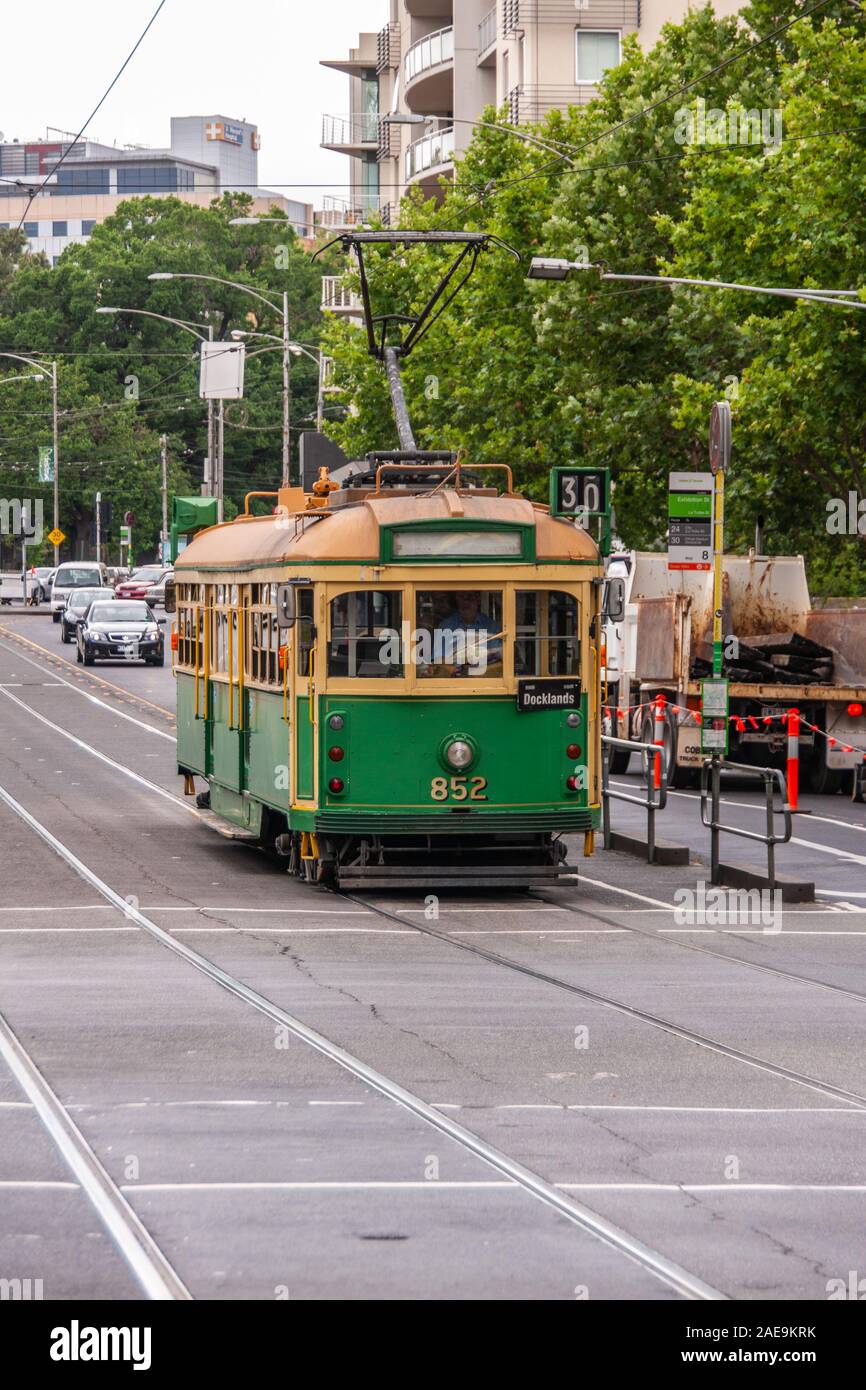 Melbourne, Australia - November 16, 2009: Green-yellow old streetcar or ...