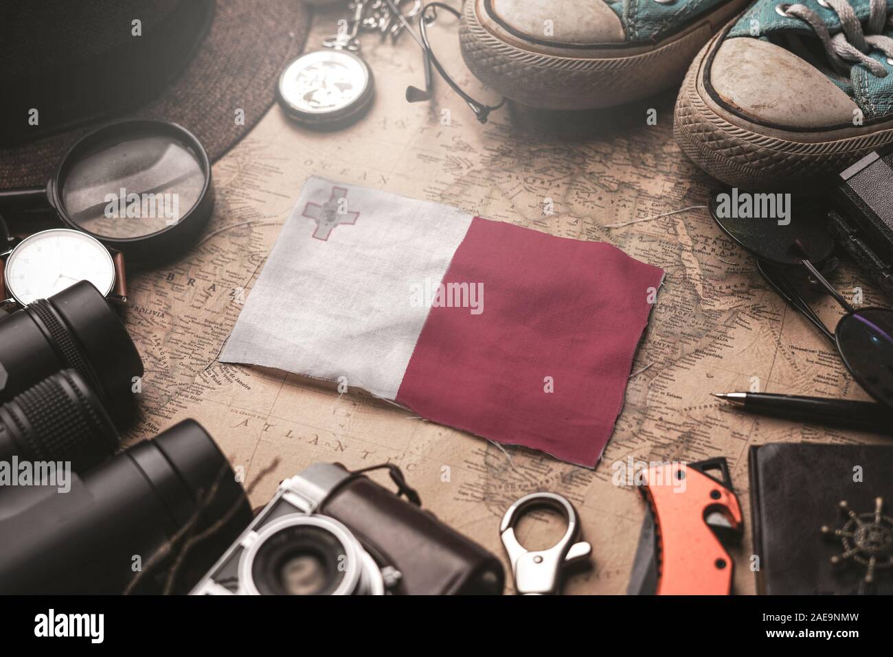 Malta Flag Between Traveler's Accessories on Old Vintage Map. Tourist ...