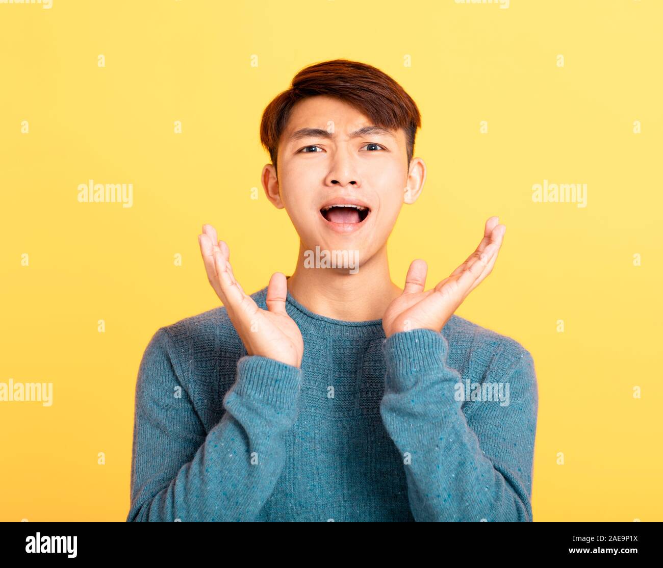 young man yelling and screaming Stock Photo - Alamy
