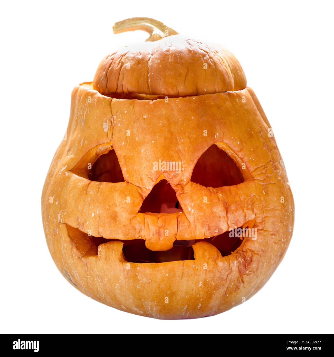 Carving scary face on pumpkin Cut Out Stock Images & Pictures - Alamy