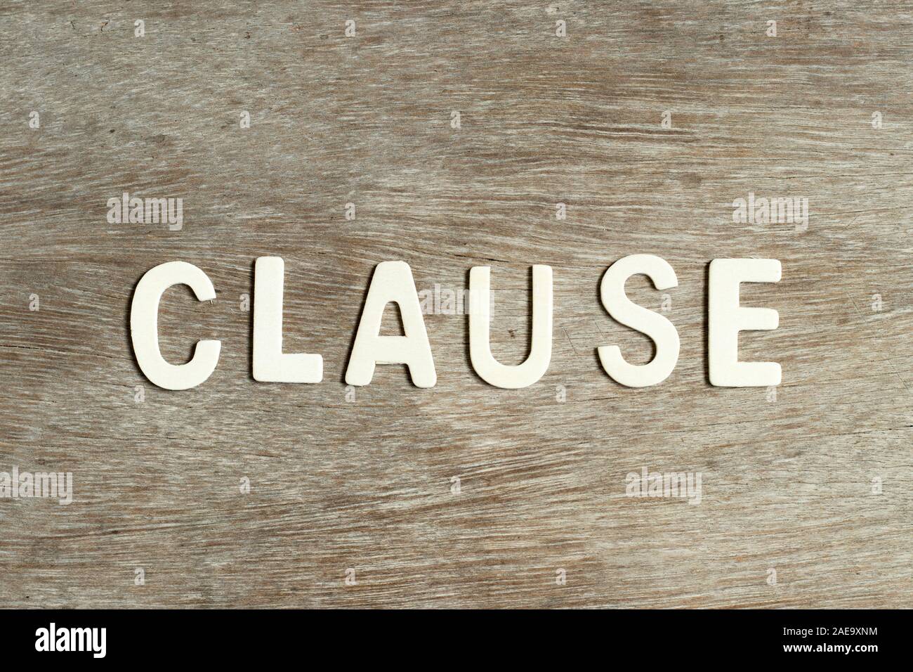 Alphabet letter in word clause on wood background Stock Photo - Alamy
