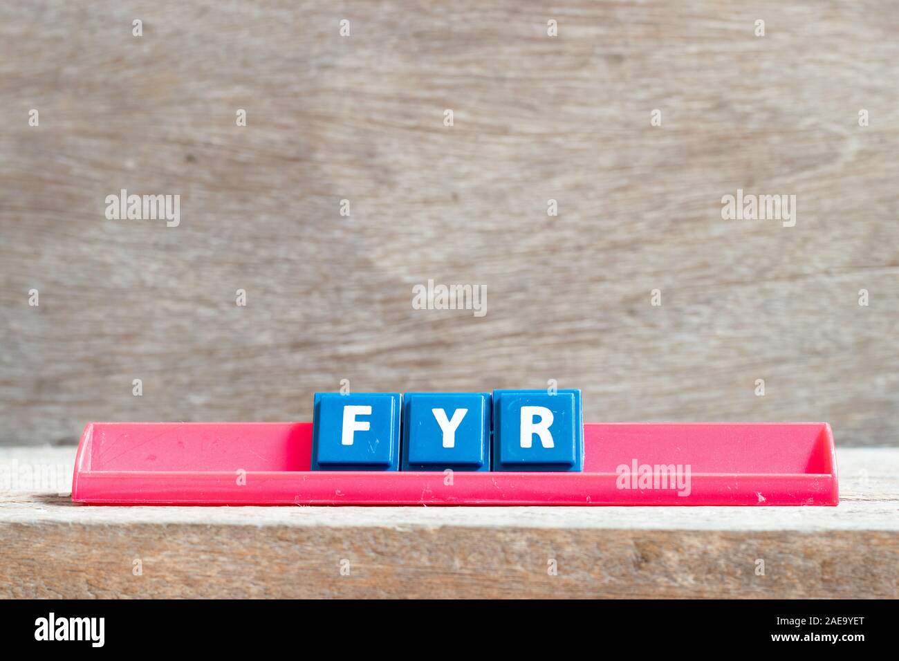 Tile letter on red rack in word FYR (abbreviation of for your reference ...
