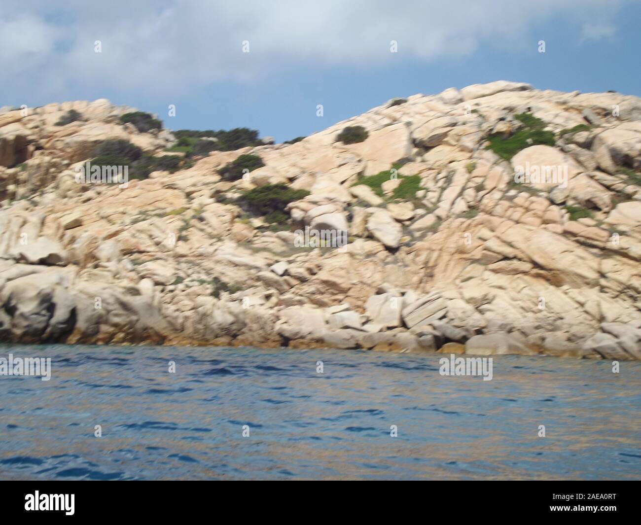 Sardinian landscape, seascape, rocks shapes, formations, blue water and ...