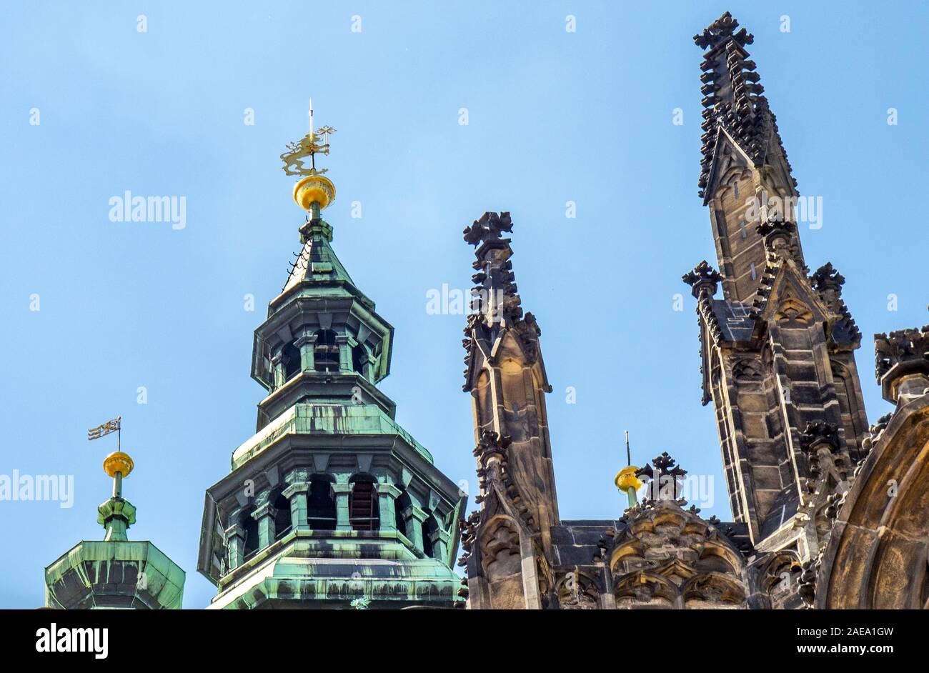 Peak of Great South Tower and sandstone spires on rooftop of Gothic St ...