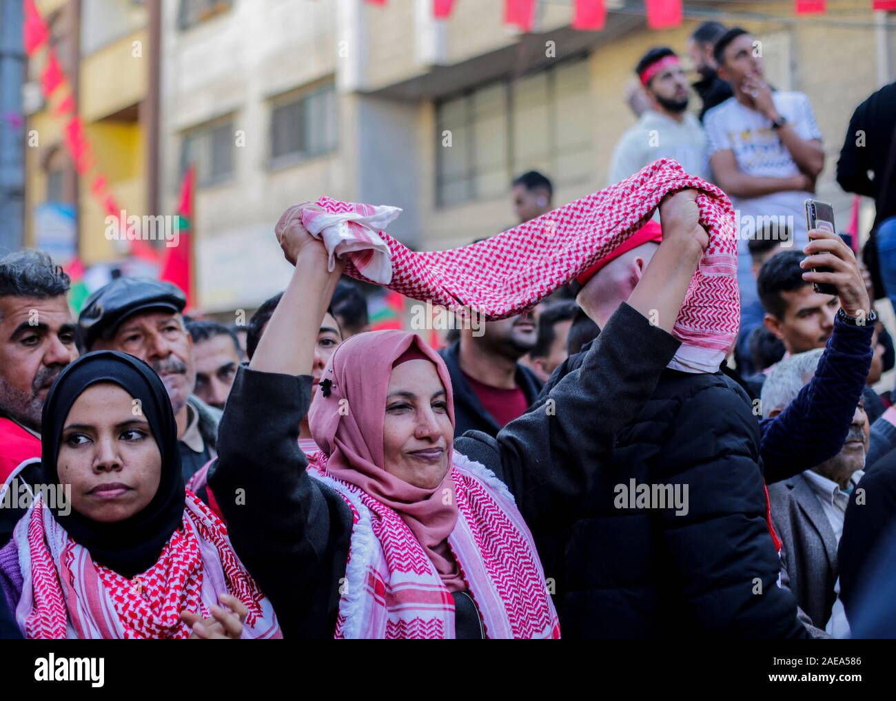 Gaza City, Palestine. 07th Dec, 2019. Palestinian woman waving a scarf ...