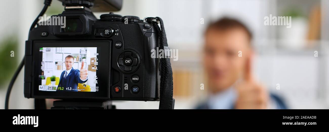 Male in suit and tie show confirm sign Stock Photo - Alamy