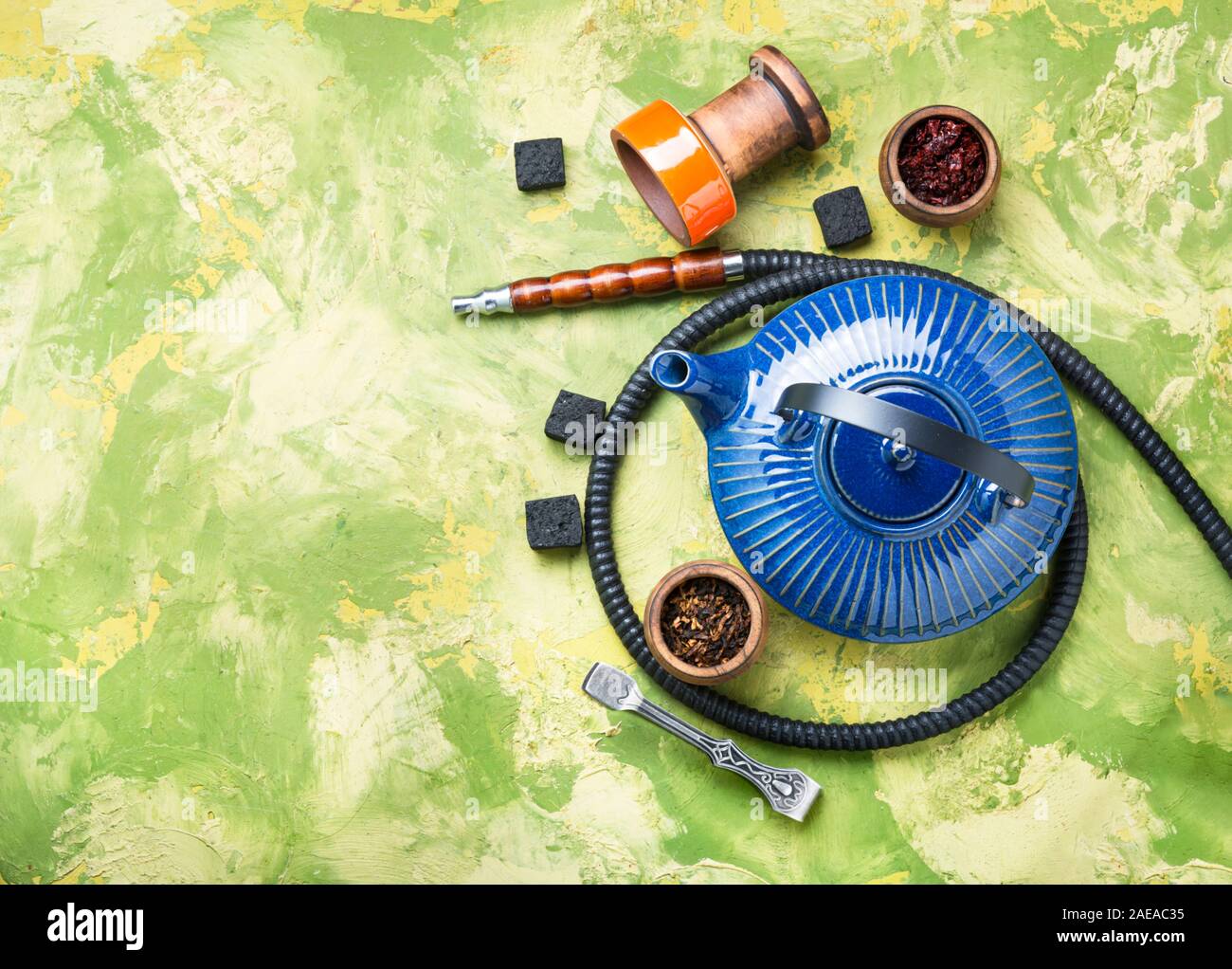 Details of tobacco hookah and teapot with tea.Eastern smoking shisha ...
