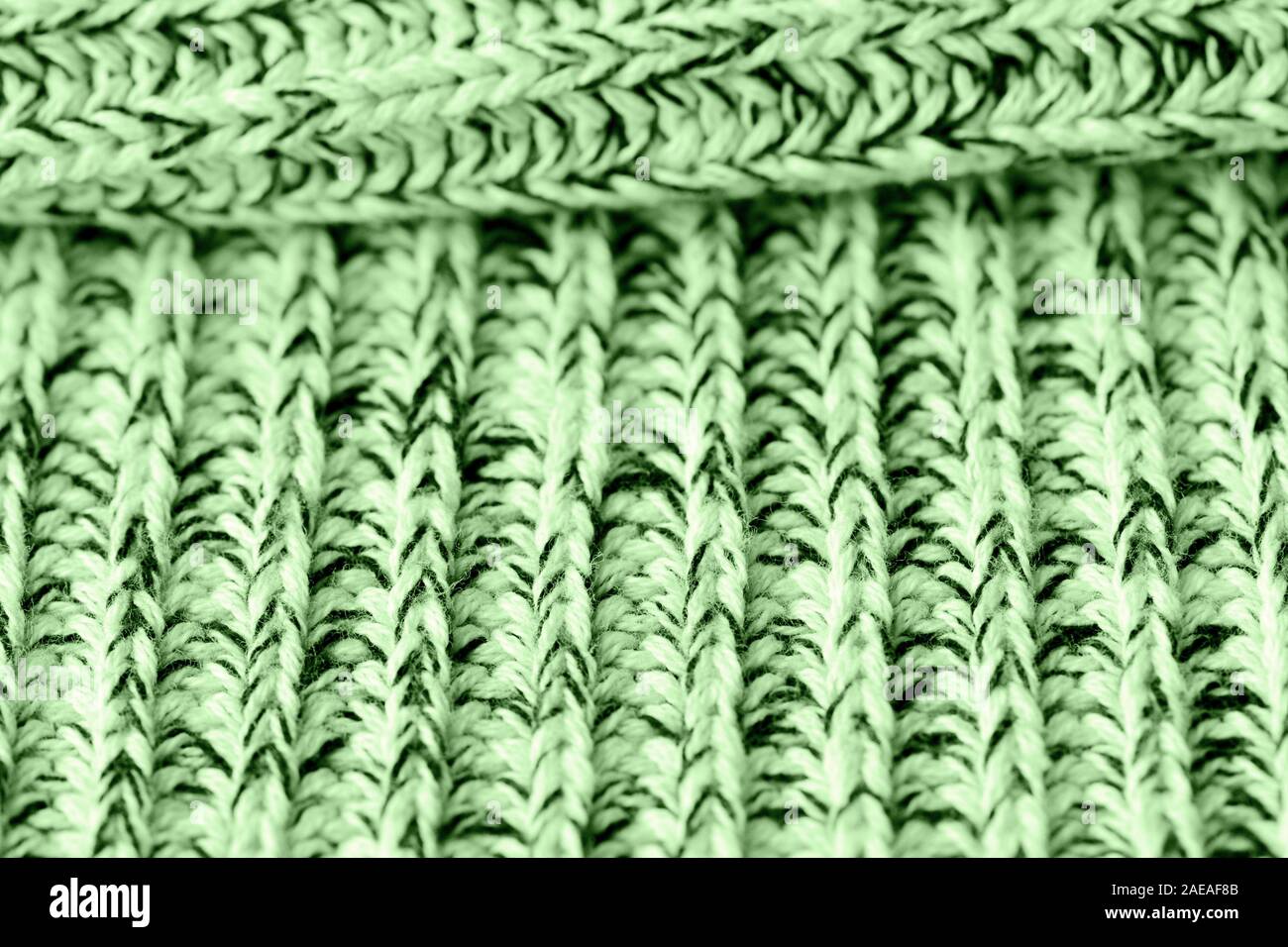 Knitted woolen texture close up. Textile background green color toned Stock Photo - Alamy