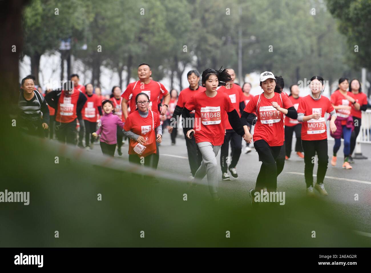 Chongqing, China. 8th Dec, 2019. People participate in the 2019 ...