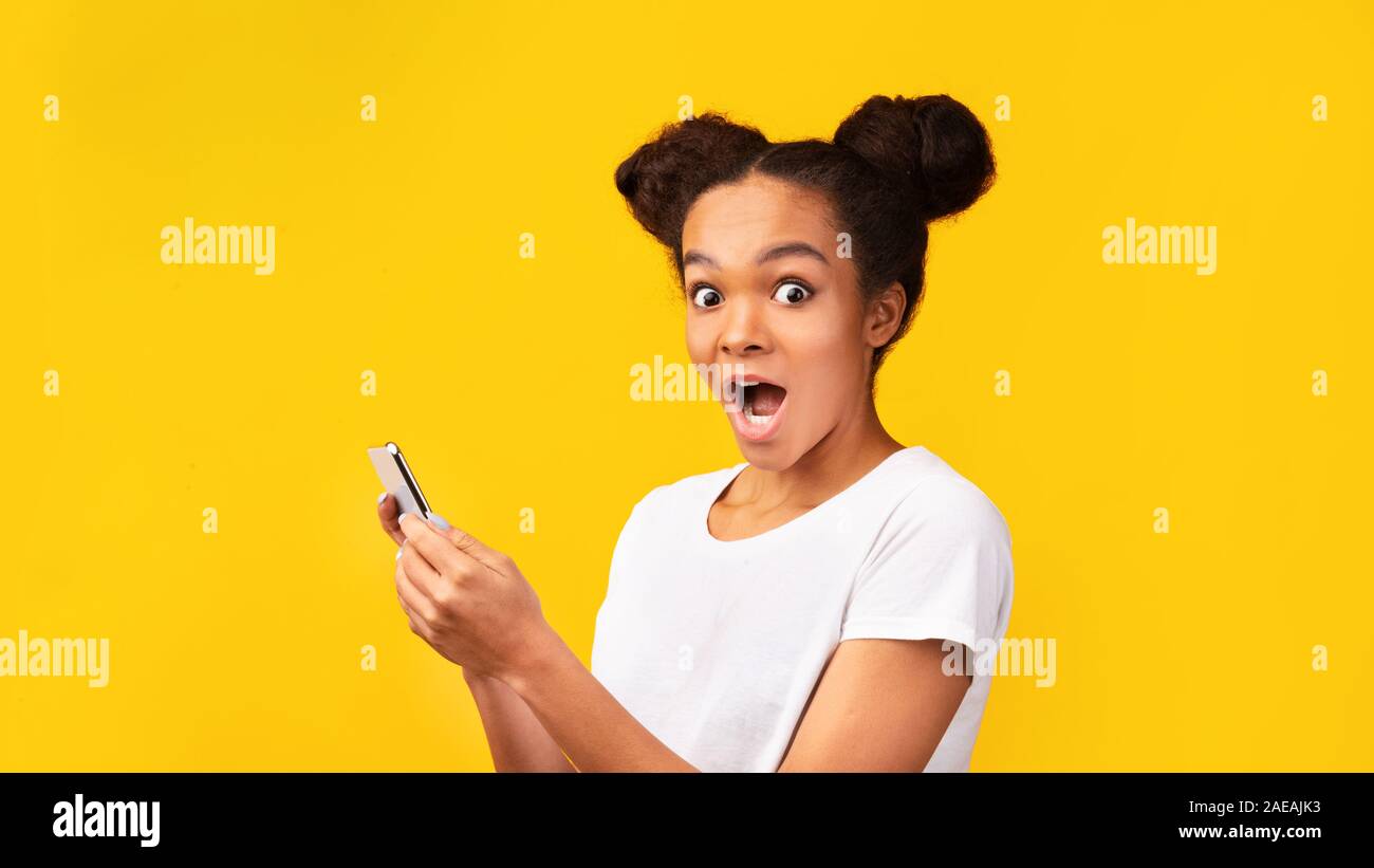 Amazed black teenager received shocking good news Stock Photo - Alamy