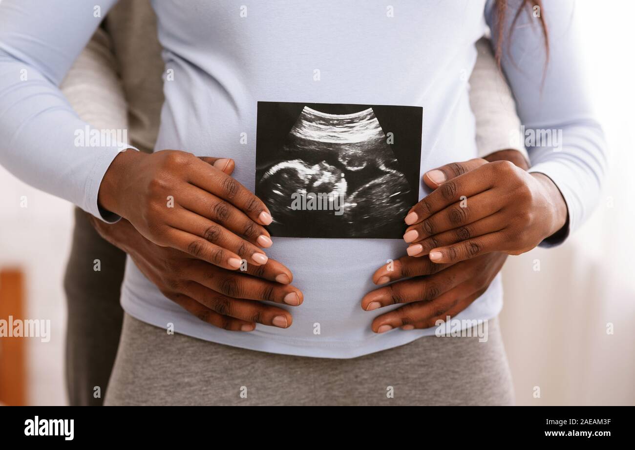 In front of her belly hi-res stock photography and images - Alamy