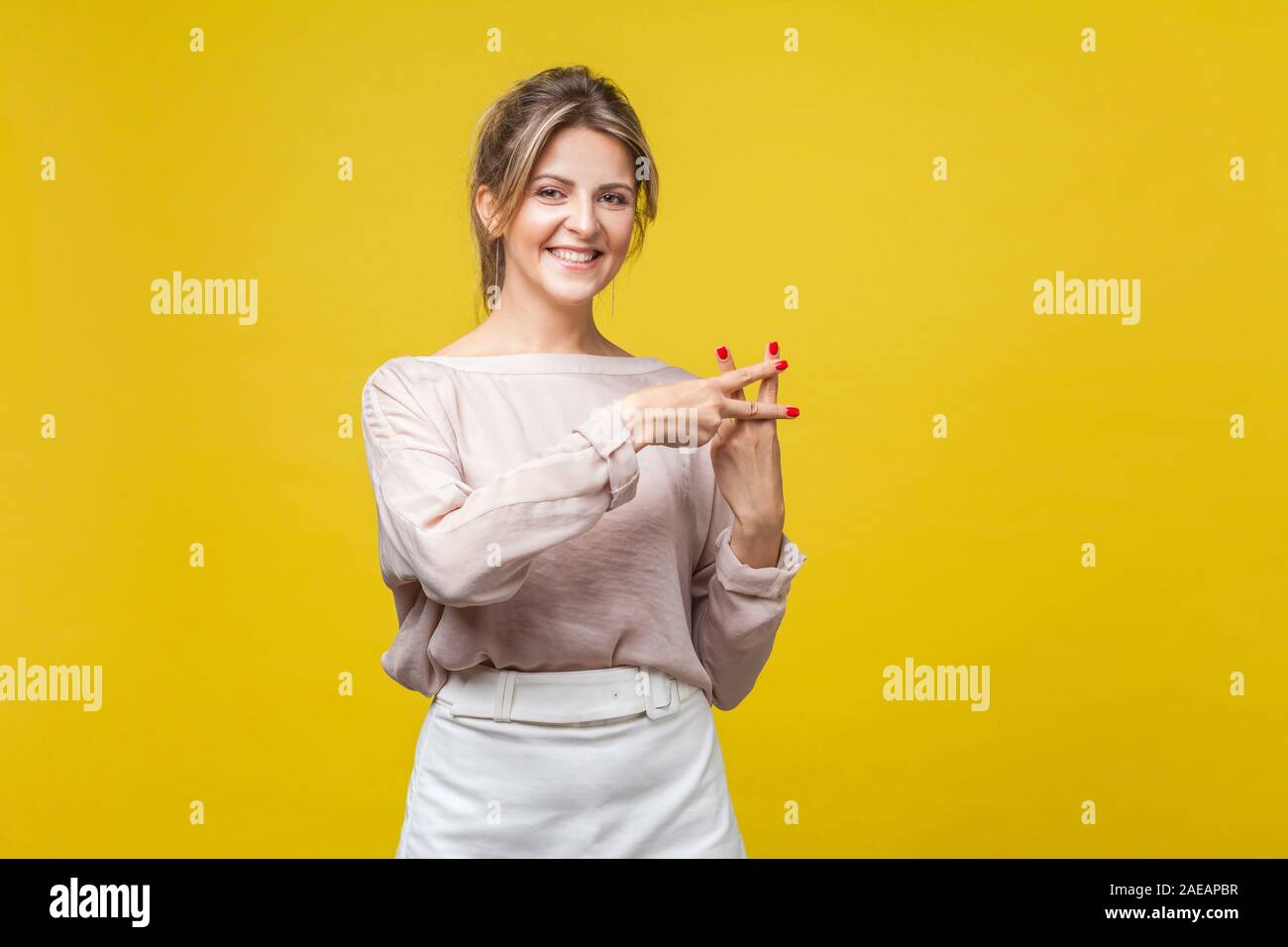Hashtag symbol. Portrait of cheerful beautiful woman with fair hair in ...