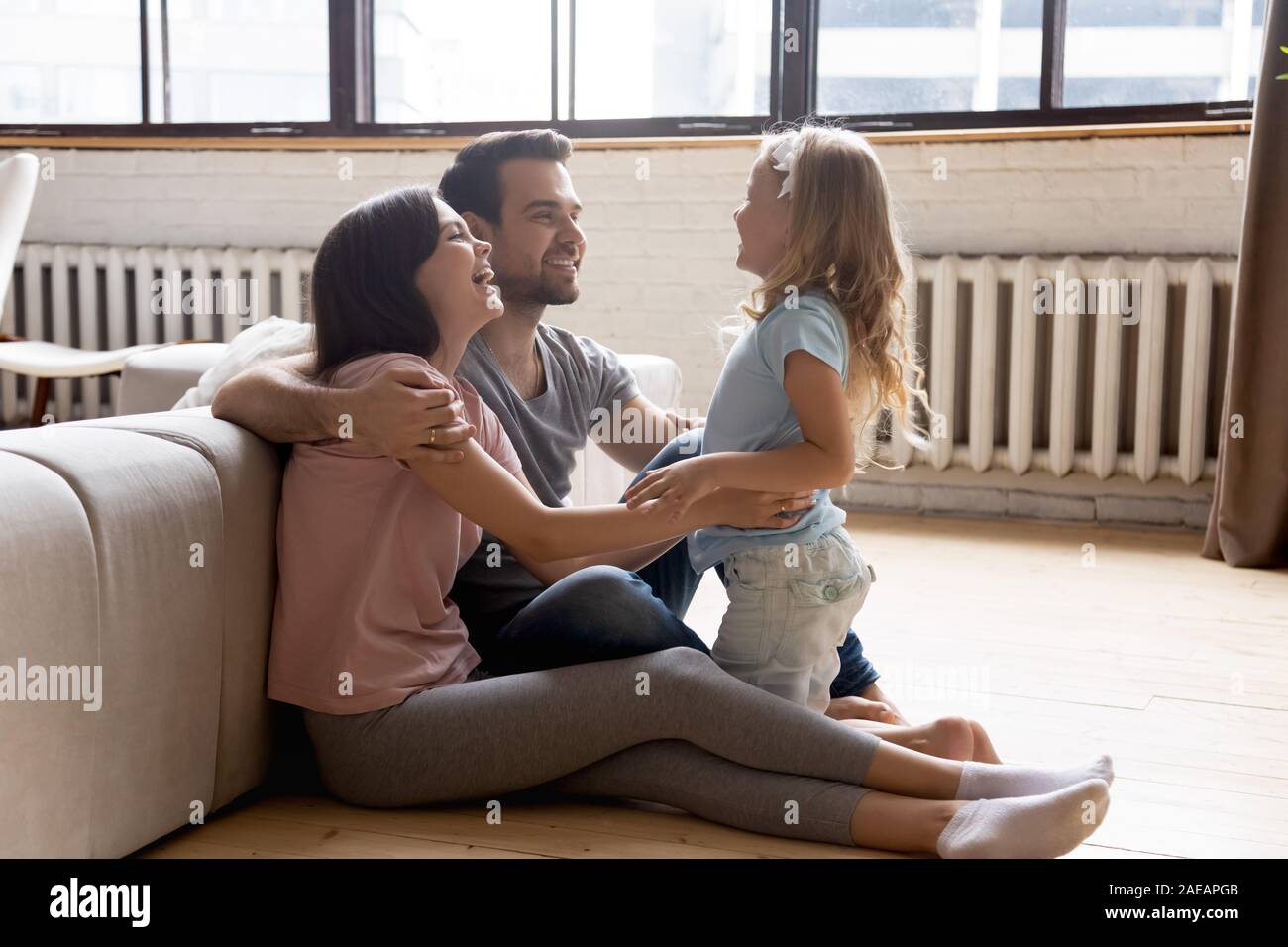 Father daughter sit on floor hi-res stock photography and images - Alamy