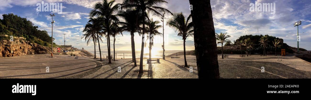 Super wide panorama from the boulevard of Arpoador backlit with ...