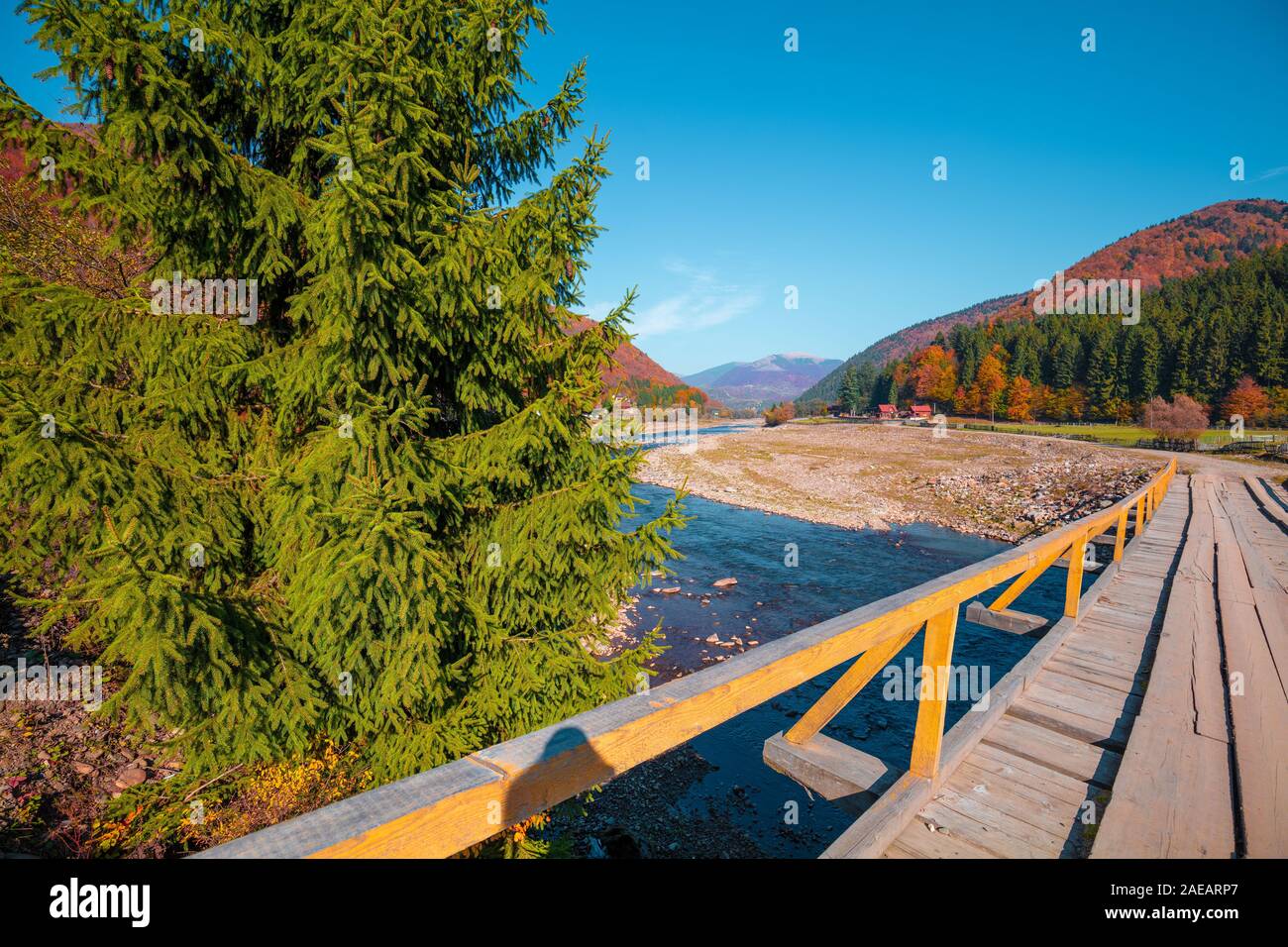 Wooden bridge over beautiful mountain hi-res stock photography and ...