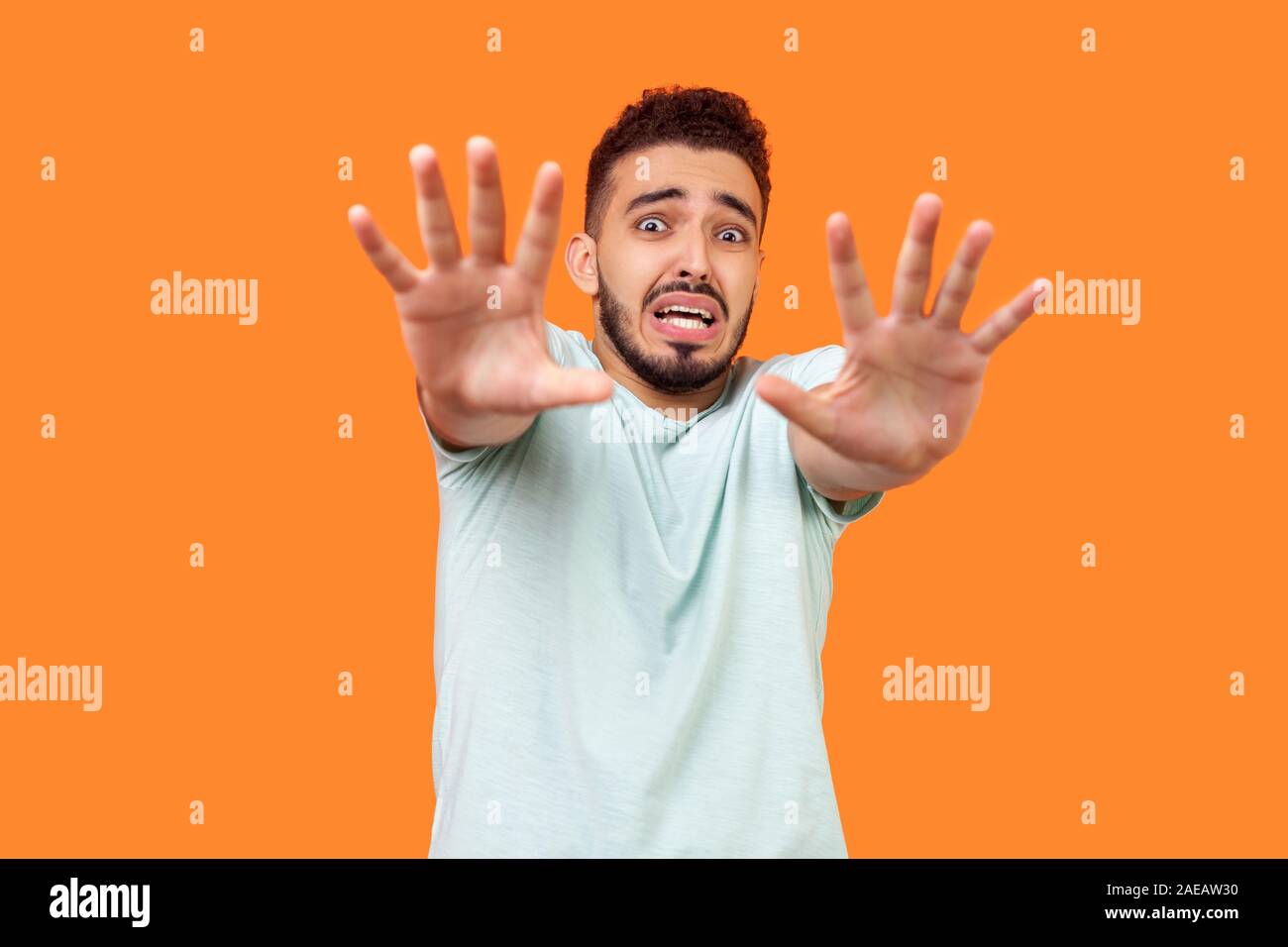 I'm afraid! Portrait of scared terrified brunette man with beard in ...