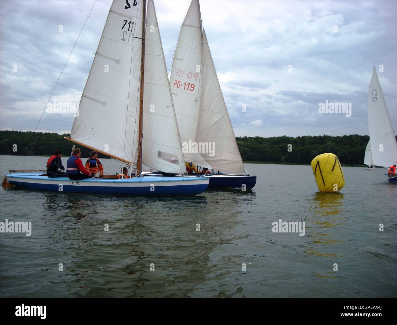 Children learning sailing, boys - young sailors, optimist dinghy and ...