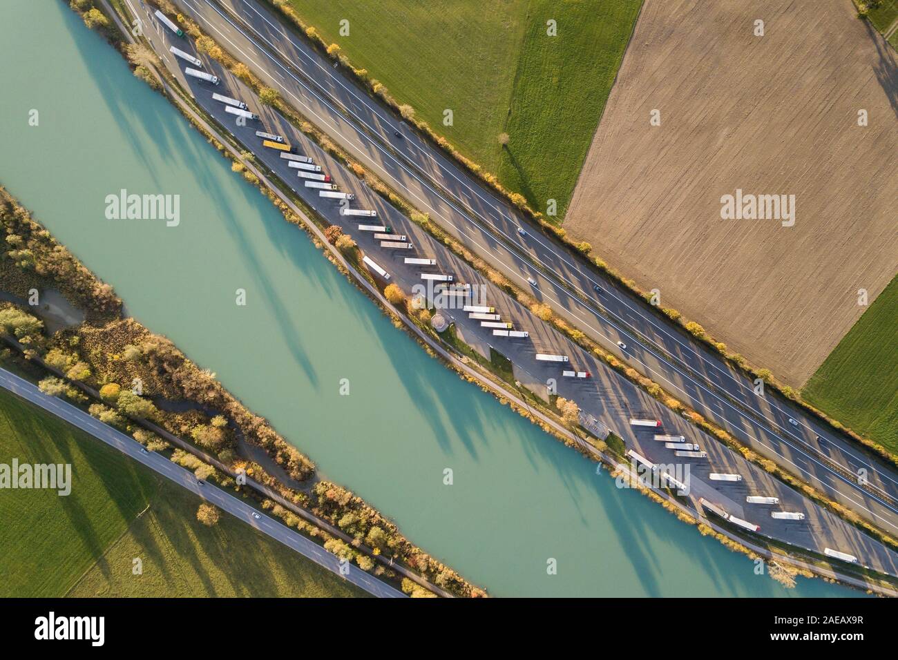 Top down aerial view of highway interstate road with fast moving ...