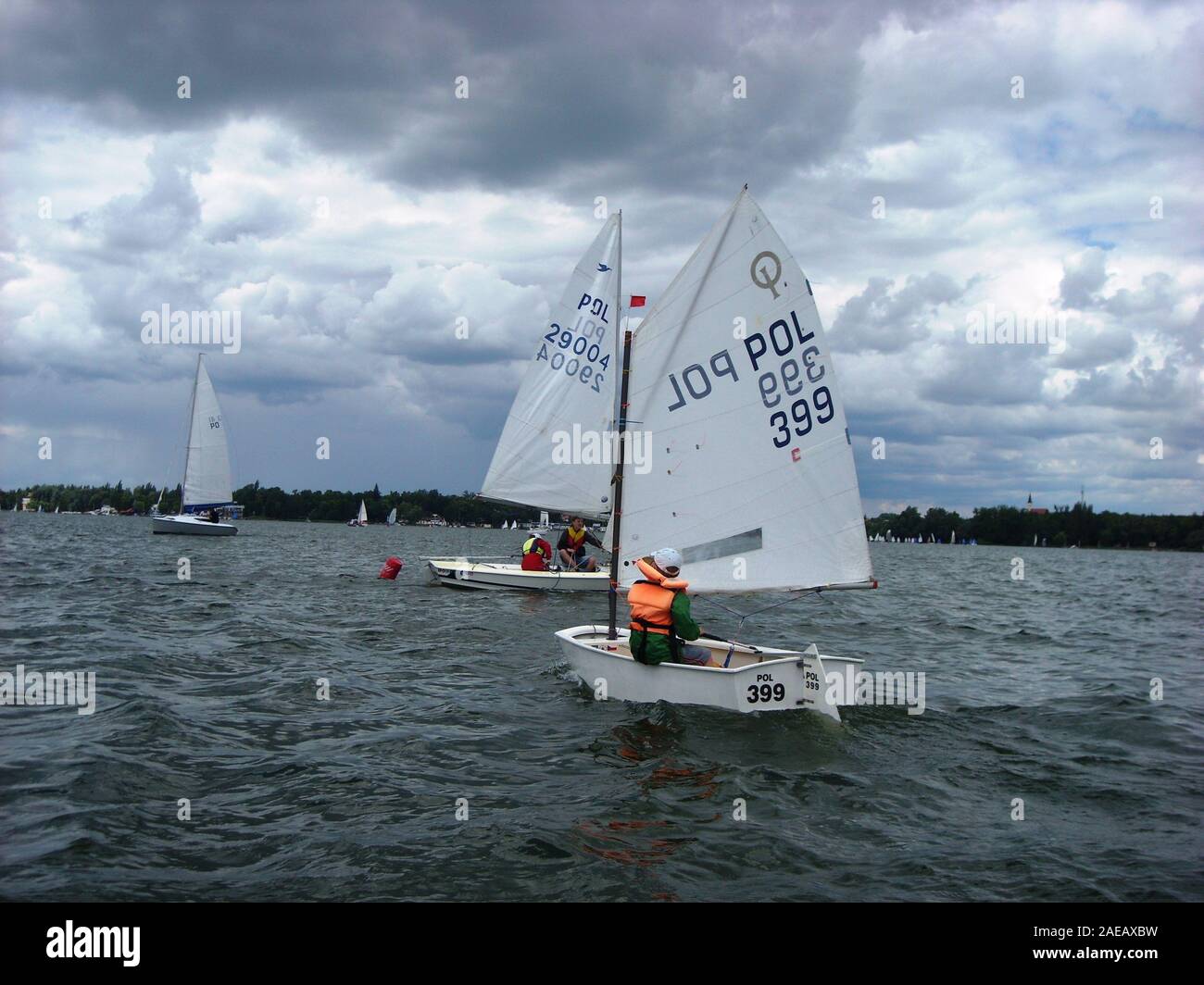 Children learning sailing, boys - young sailors, optimist dinghy and ...