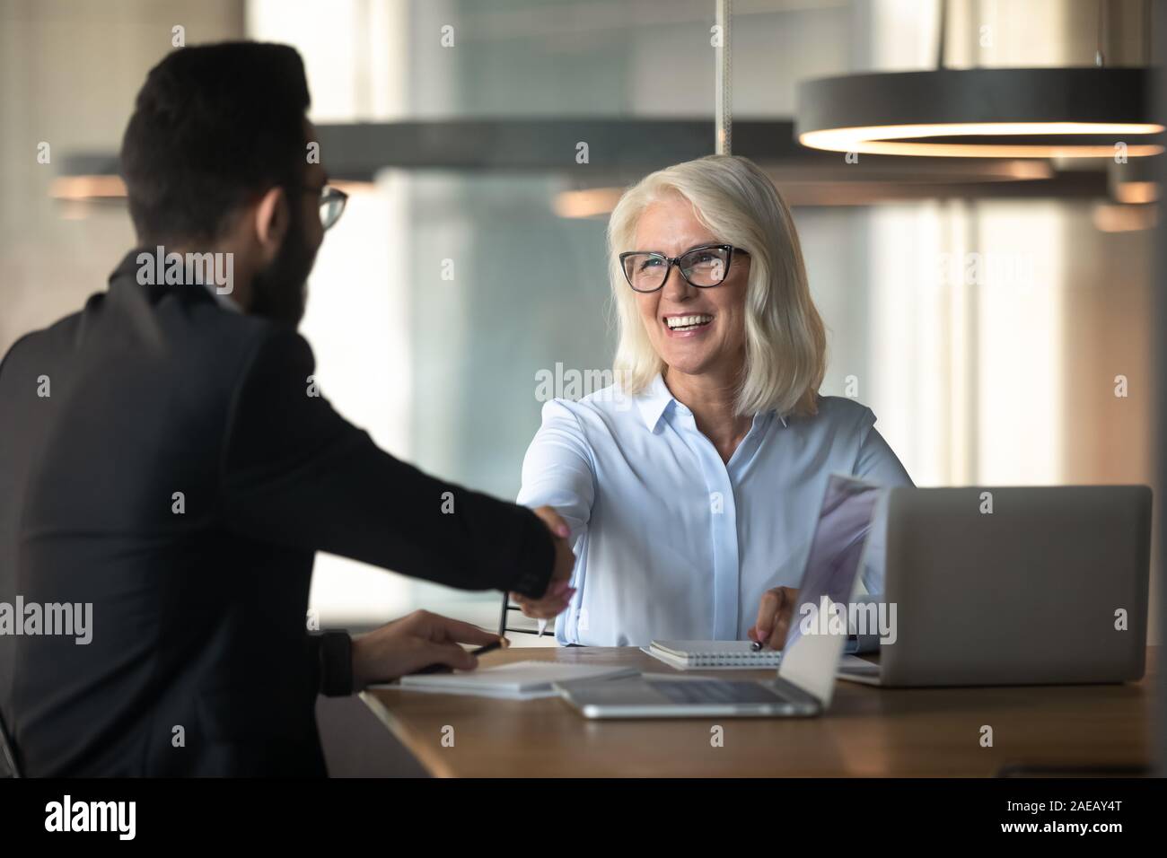 Diverse office worker employee greeting hi-res stock photography and images - Alamy