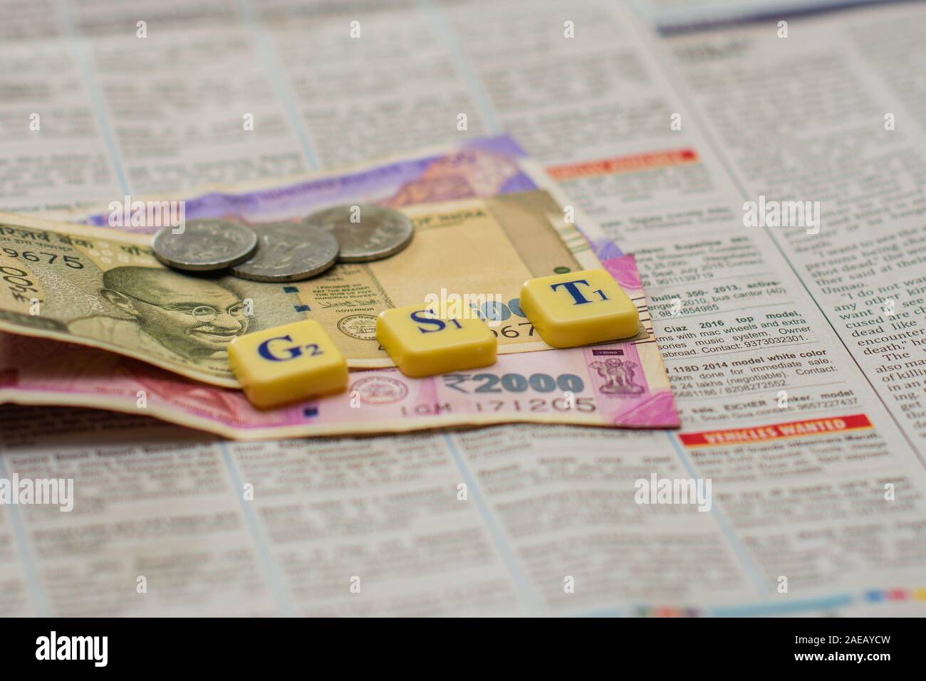 GST and TAX spelt out usingscrabble and indian currency and notes Stock ...