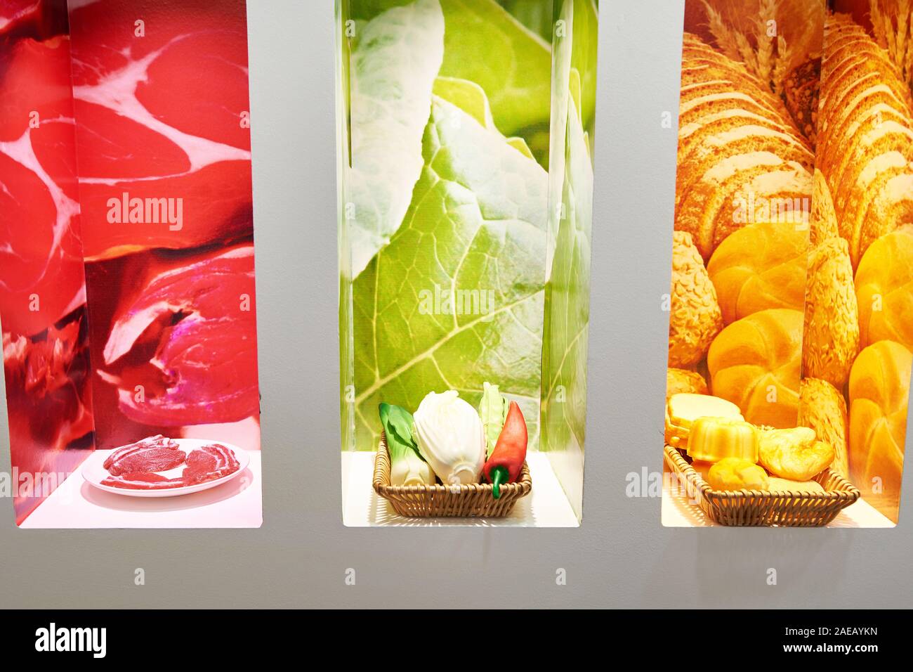 Meat, vegetables and bread in the shop window Stock Photo - Alamy
