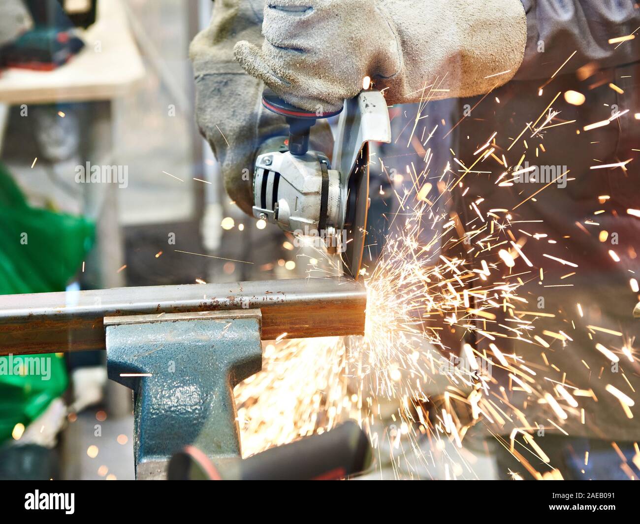 Metal cutting with angle grinder with sparks Stock Photo - Alamy