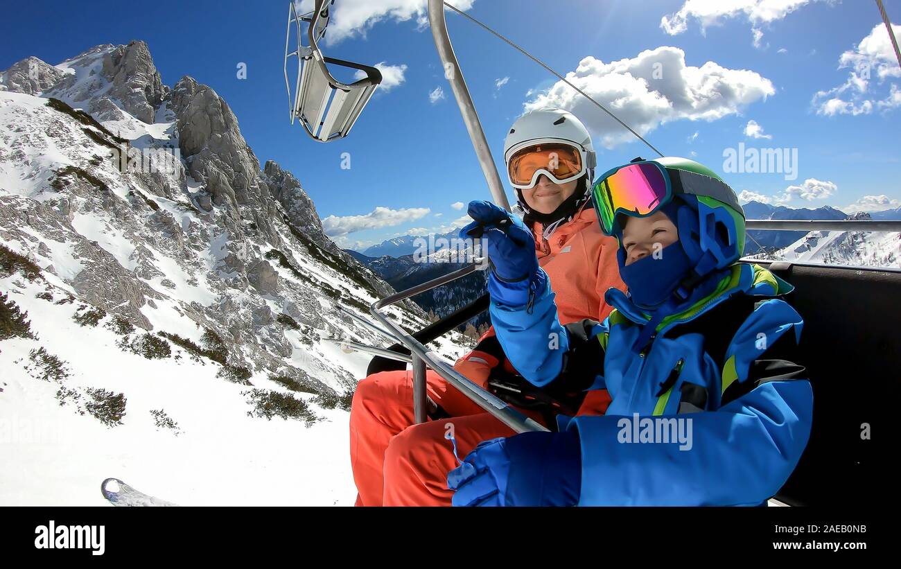 Little boy skiing in the Alpine resort. A 6 year old child enjoys a ...