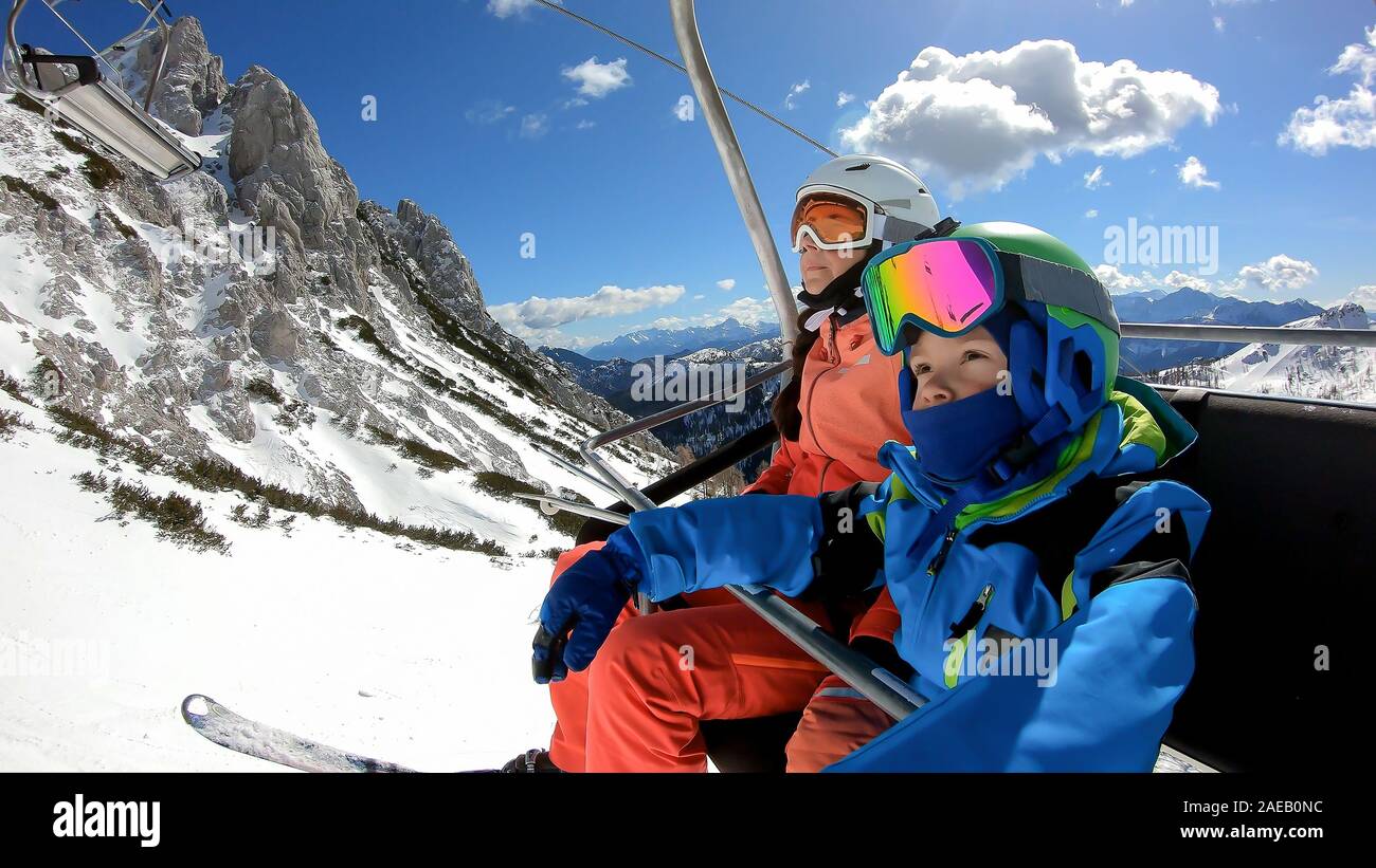 Little boy skiing in the Alpine resort. A 6 year old child enjoys a ...