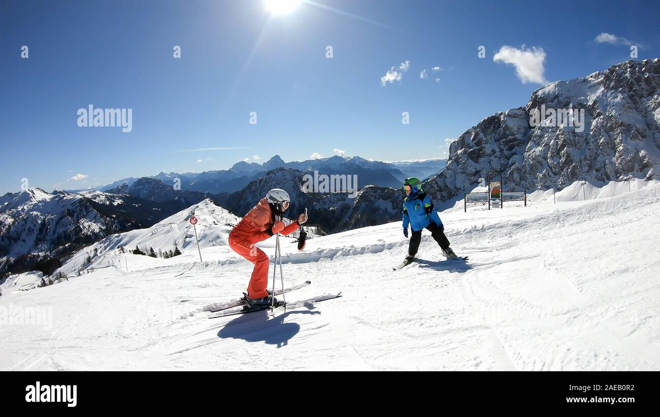 Little boy skiing in the Alpine resort. A 6 year old child enjoys a ...