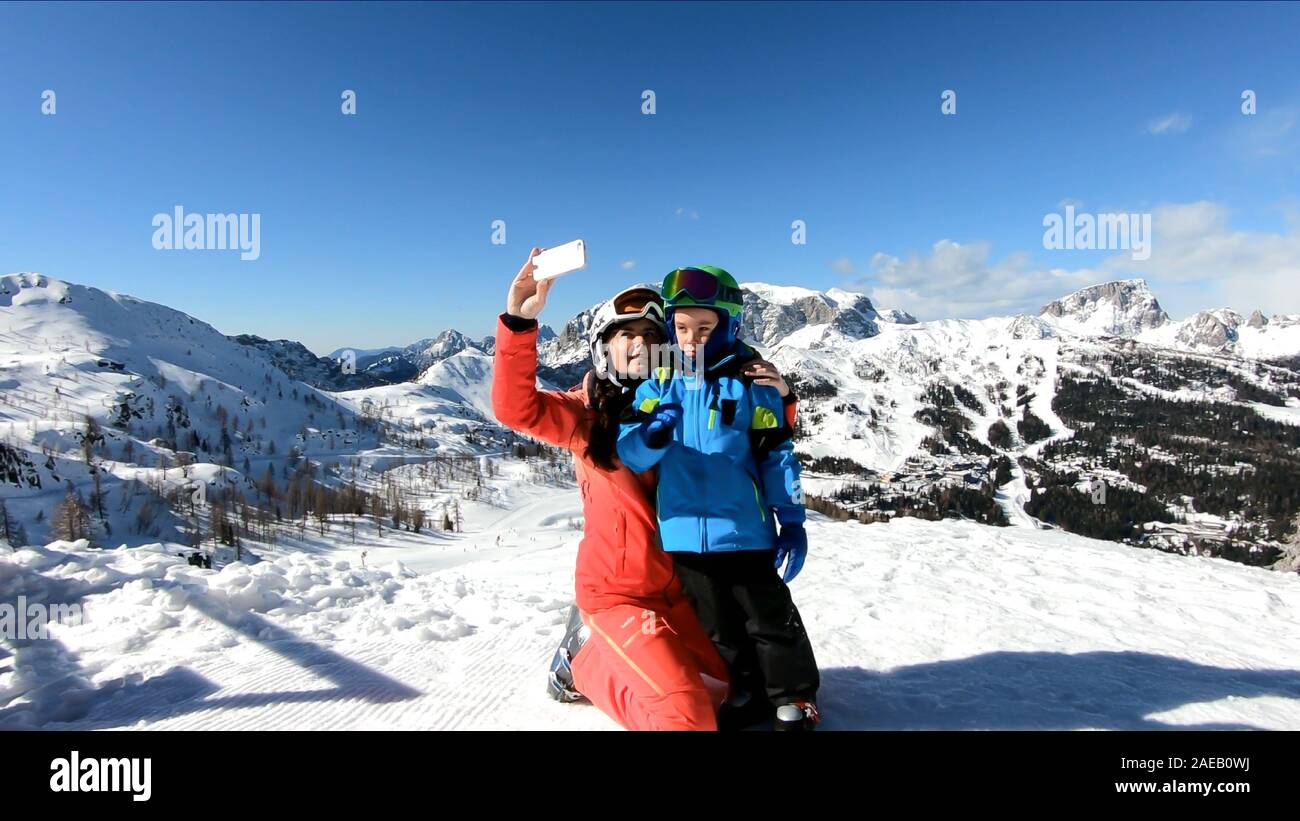 Little boy skiing in the Alpine resort. A 6 year old child enjoys a ...
