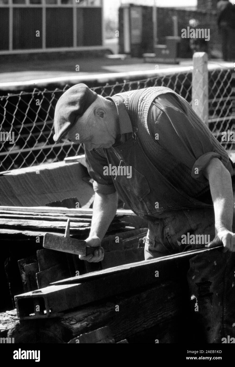 Old man, with flat cap, craftsman at work,Industrial West Yorkshire, in ...