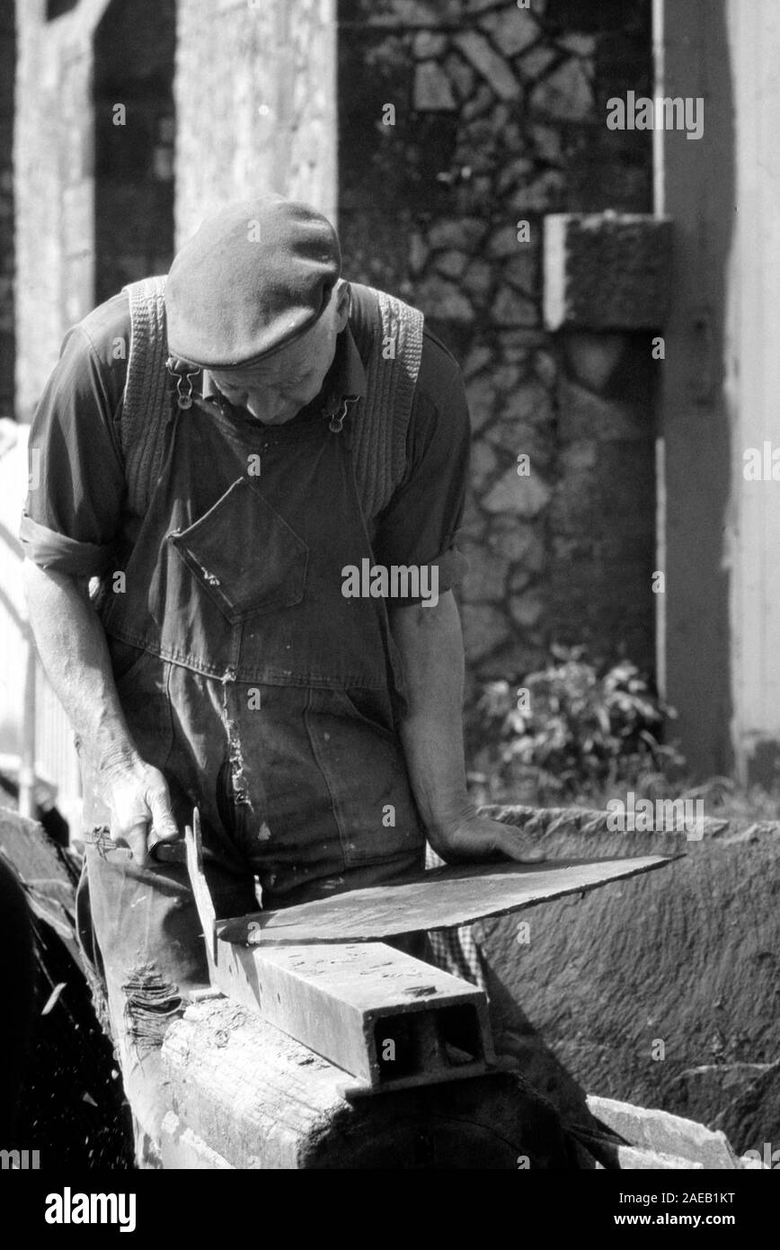 Old man, with flat cap, craftsman at work, Industrial West Yorkshire ...