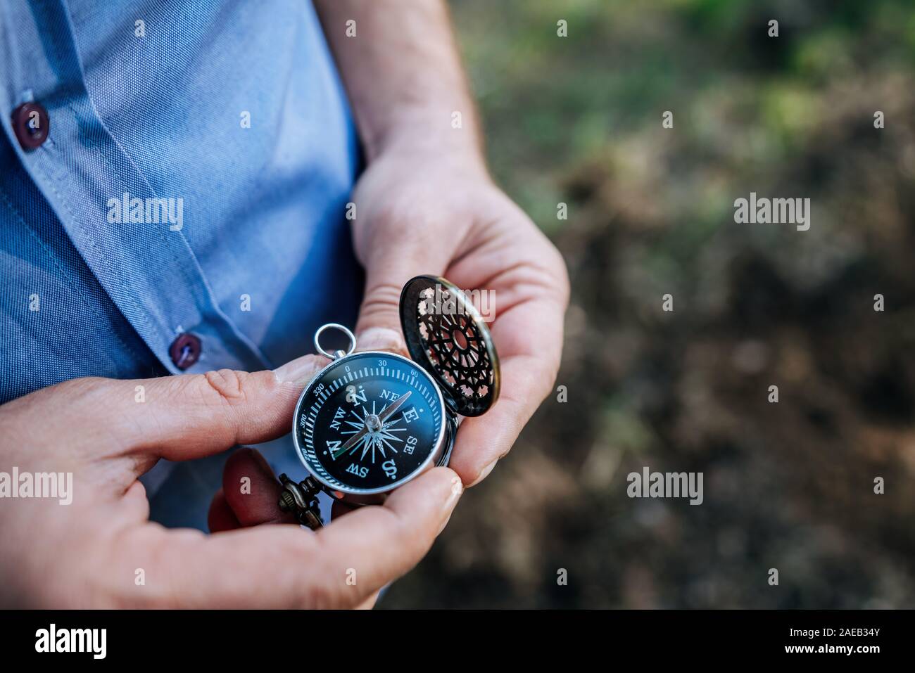 finding our way in nature with a compass, looking for the right ...