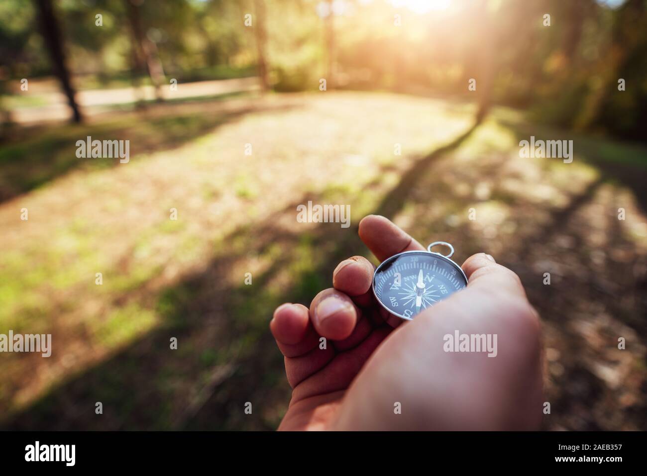 finding our way in nature with a compass, looking for the right ...