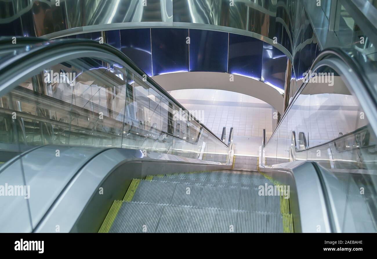 escalator of modern building with moving steps Stock Photo - Alamy