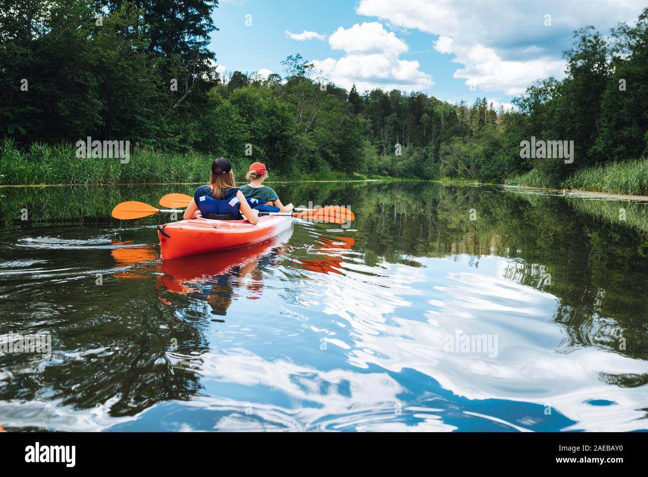 Kayaking with family and friends on river Stock Photo - Alamy