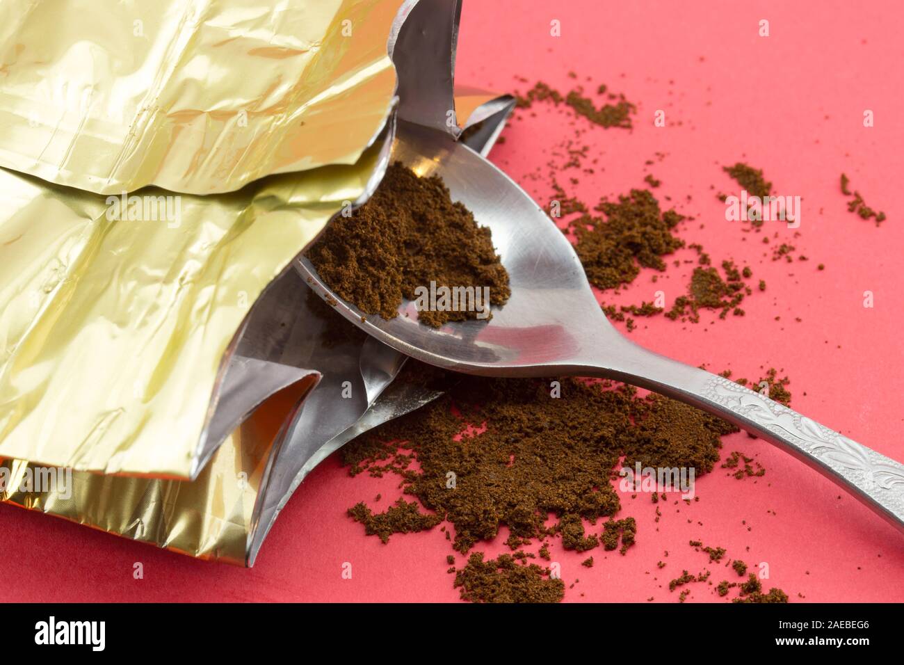 Ground coffee spilled from the packaging. Grinded coffee powder in ...