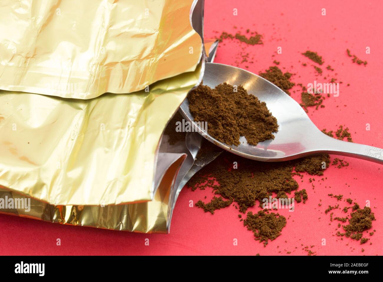 Ground coffee spilled from the packaging. Grinded coffee powder in ...