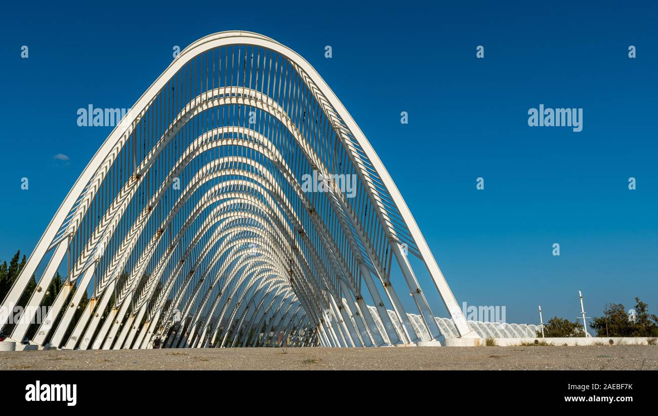 Arched monument under clear blue sky at Olympic Complex in Marousi ...